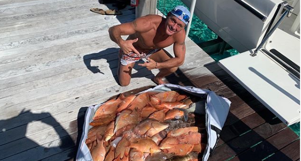 Tim McGraw Shows Off His Ripped Body As He Catches A Seriously Big Fish ...