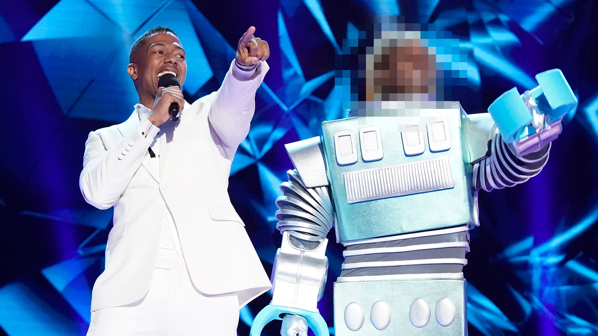 'The Masked Singer' Unmasks The Robot To Reveal This Iconic Rapper | Access