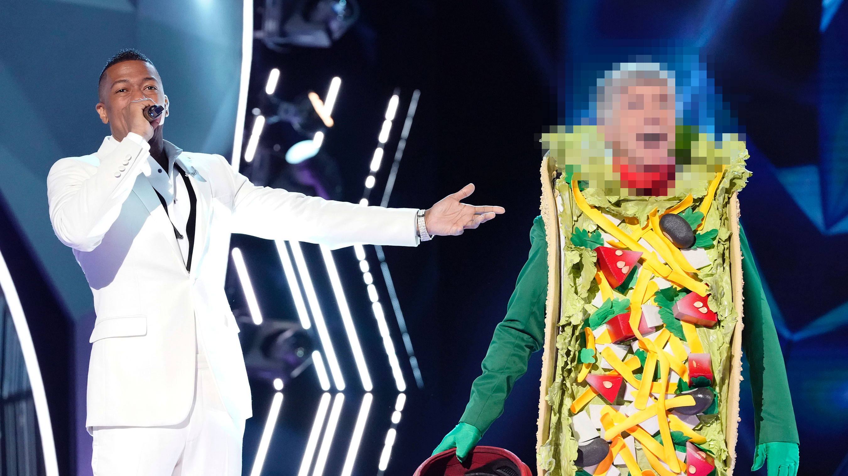 'The Masked Singer' Taco Revealed To Be This Longtime TV Host | Access