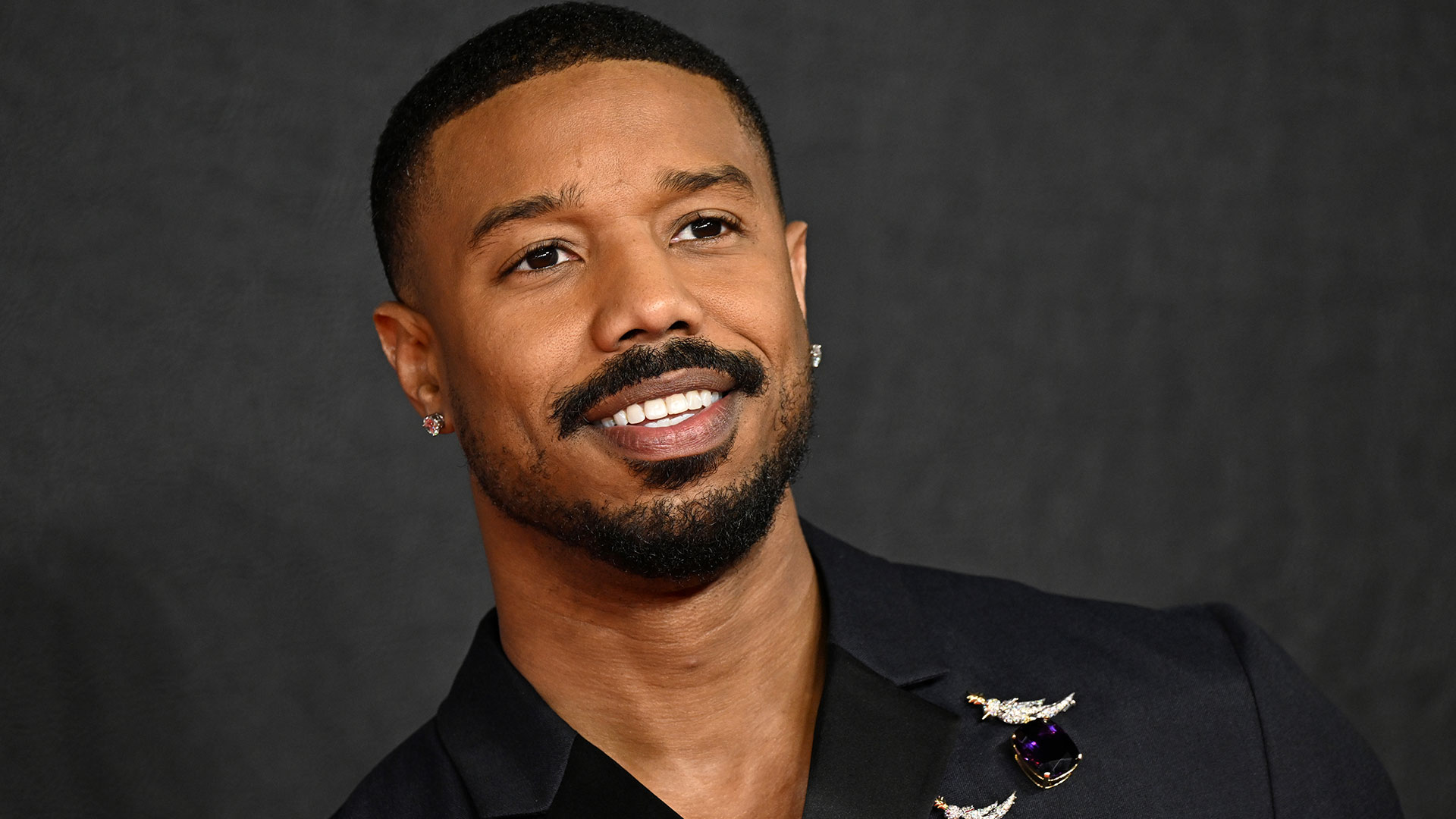 Michael B. Jordan Suits Up In Dapper Look At 'Creed III' Premiere | Access