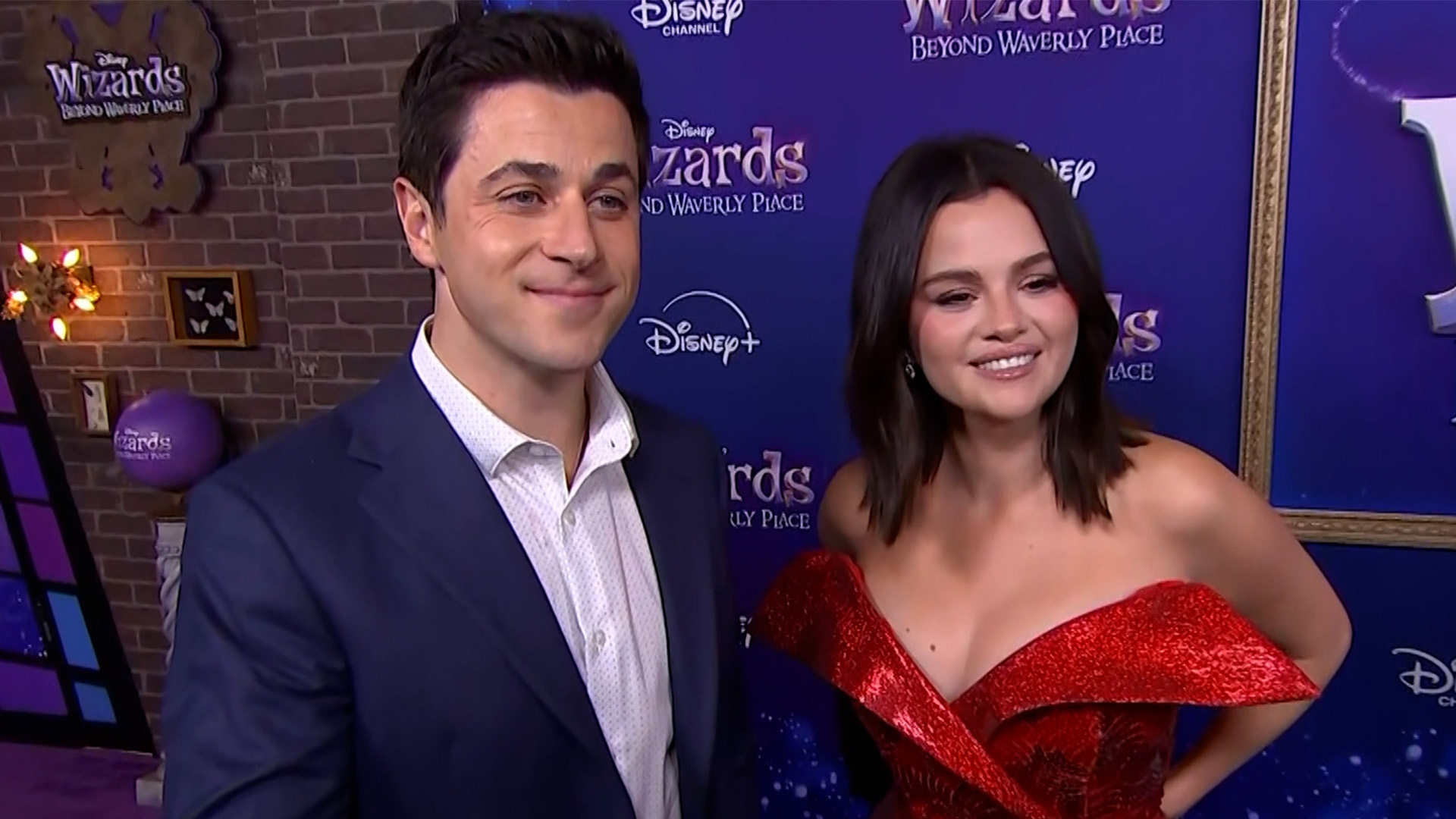 Selena Gomez & David Henrie Sing Funky Hat Song At 'Wizards Beyond Waverly Place' Carpet | Access